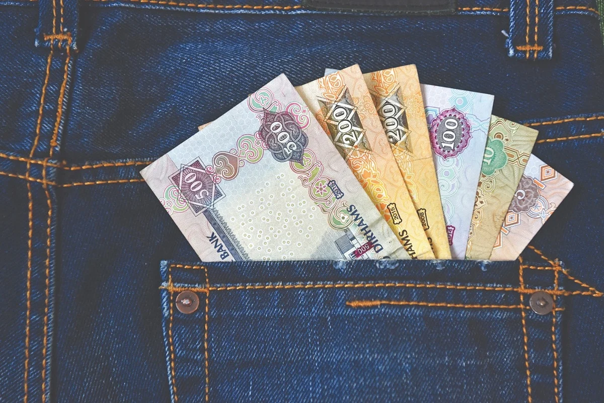 'Think twice before spending': Some UAE expats are using cash over ...