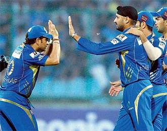 Tendulkar and Dravid sign off in coloured clothes