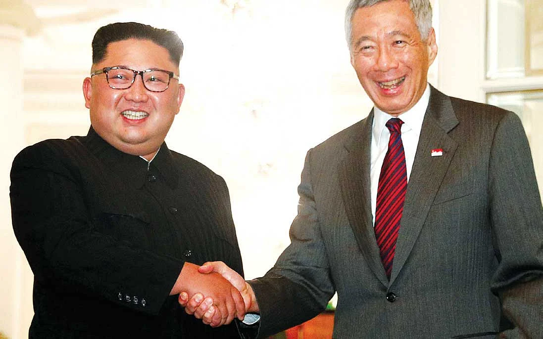 Feeling good, Trump, Kim land for summit | Khaleej Times