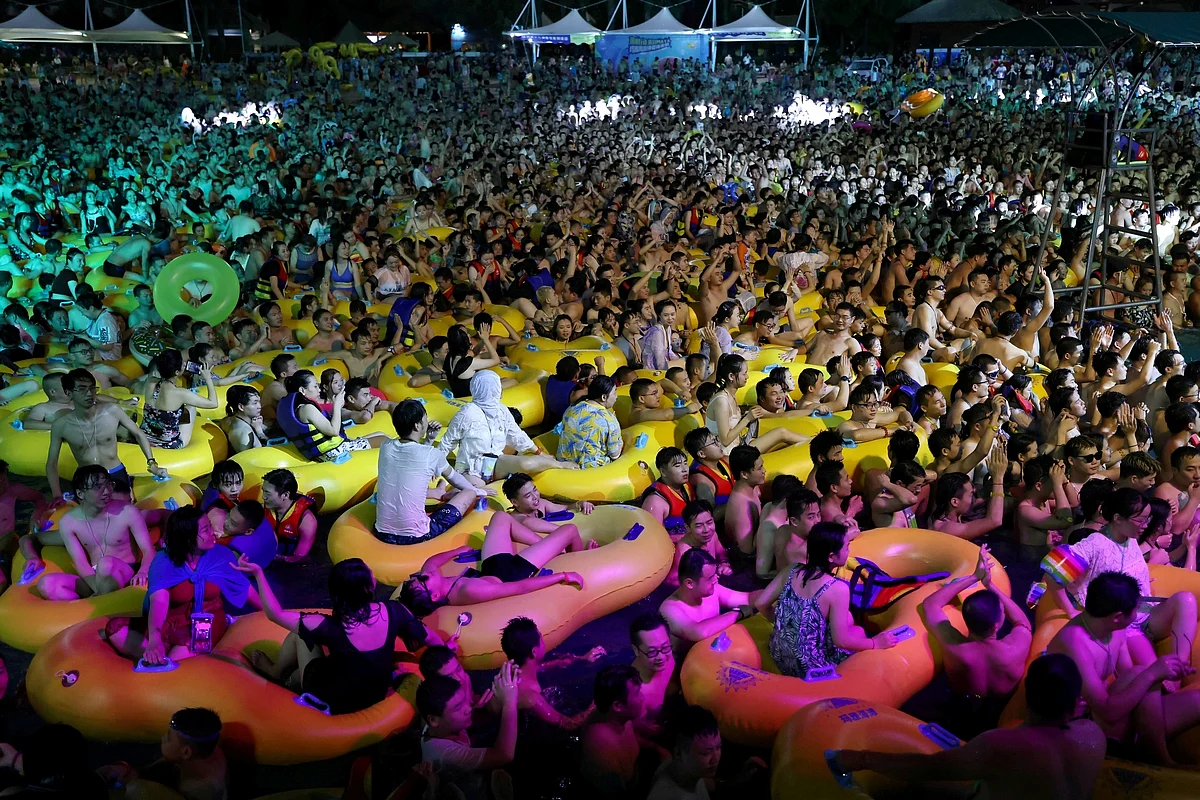 Chinese media defend Wuhan park after viral pool party sparks Covid-19 ...
