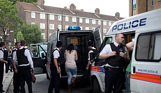 Police raid houses across UK to make riot arrests