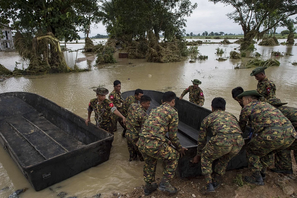 Rescuers struggle to reach stranded in Myanmar dam flooding
