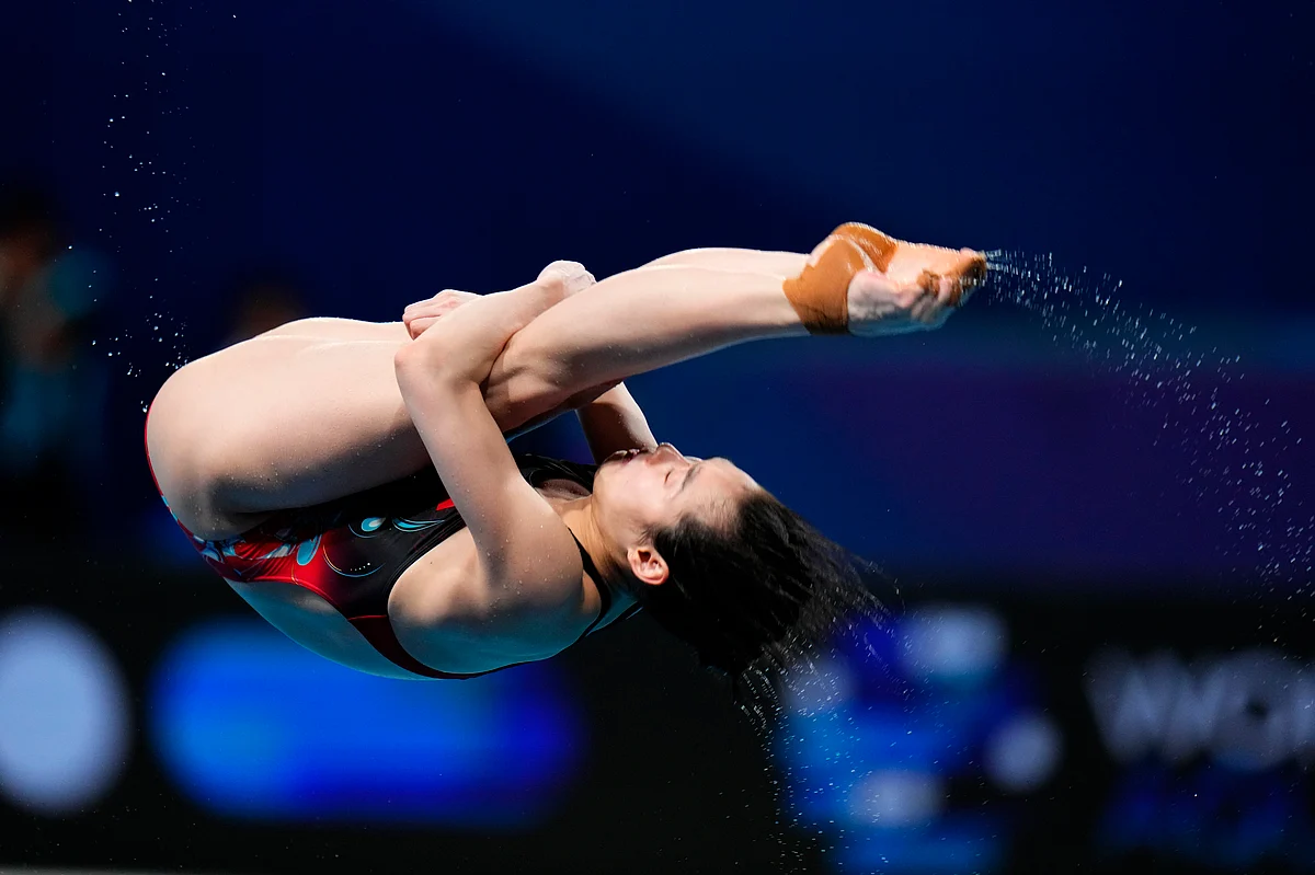 Chang Yani upsets two-time world champion Chen for diving gold at ...