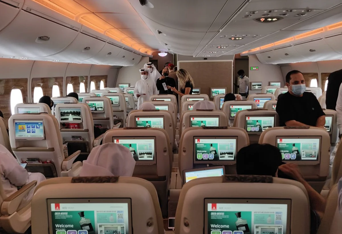 Covid: Special Emirates flight with vaccinated crew, passengers takes ...