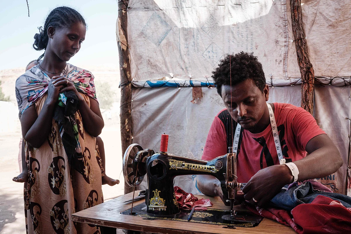 Tailor of Tigray mends refugees’ clothes and hearts