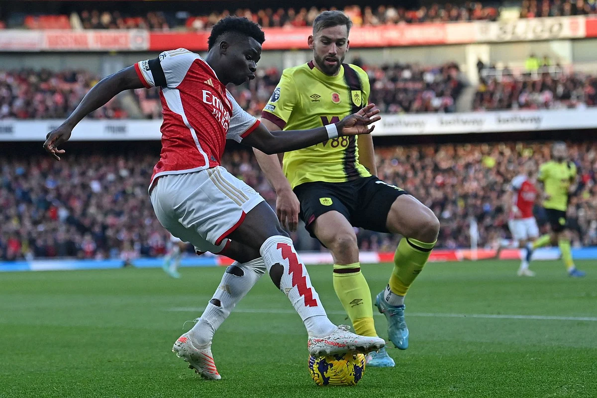 Arsenal draw level with City following hard-fought win over beleaguered ...