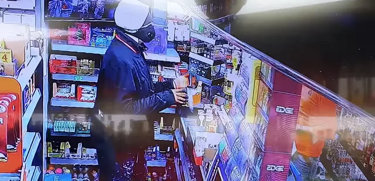 Watch: Shopkeeper fends off robber with knife; video goes viral ...