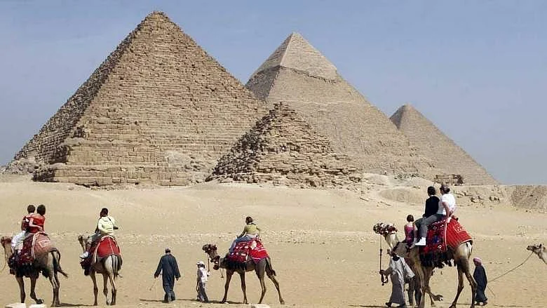 Two killed after bomb hits tourist bus near Egypt's Giza pyramids ...