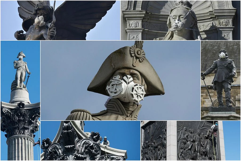 Anti-pollution activists cover London statues with masks