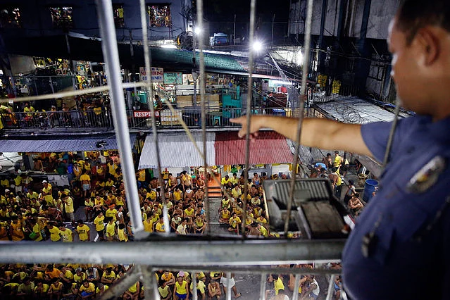 Overturned pail sparks deadly riot at overcrowded Philippine jail ...