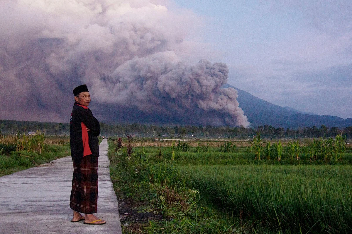Volcano erupts in eastern Indonesia, spews miles-high ash tower ...