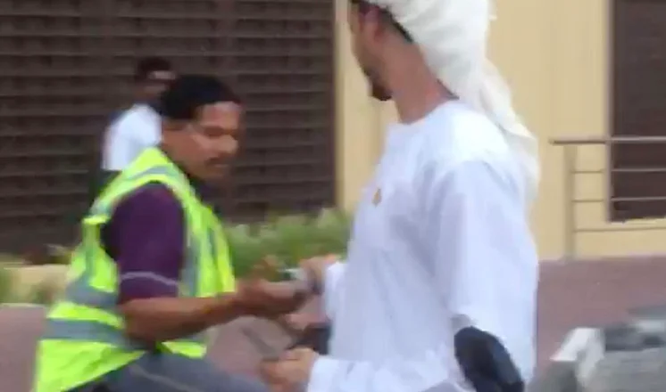 Police probe men caught giving away cash to strangers in Dubai ...