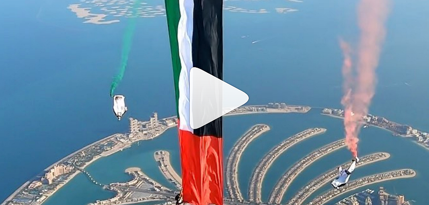 Video: Largest flag free fall world record set in Dubai skies ahead of ...
