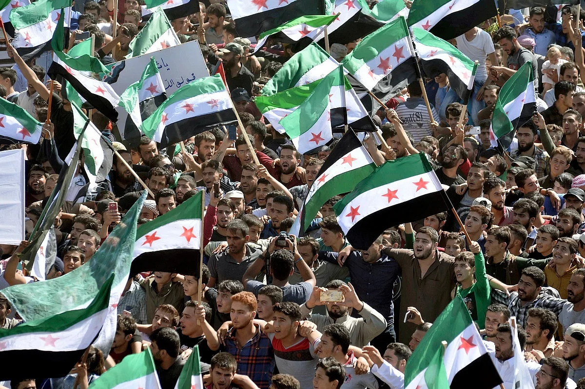 Defying dangers, residents of Idlib protest against Assad | Khaleej Times