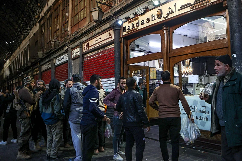 Syrians taste freedom at famous Damascus ice cream parlour