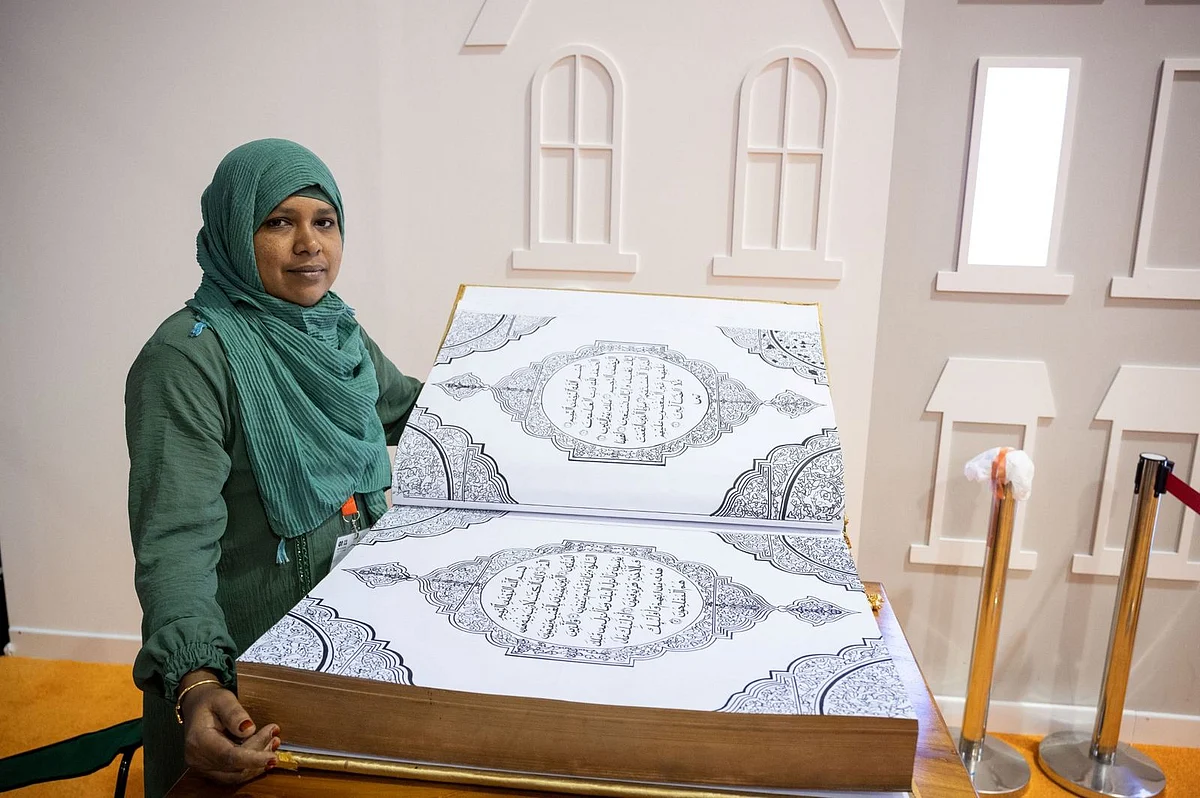 Look: Over 30kg calligraphic handwritten Holy Quran made on ivory pages ...