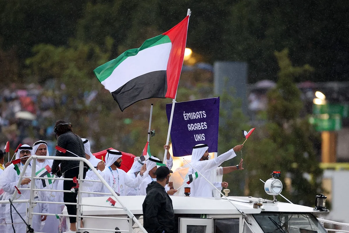 Emirati athletes raise UAE flag as teams sail down Seine in Olympic ...