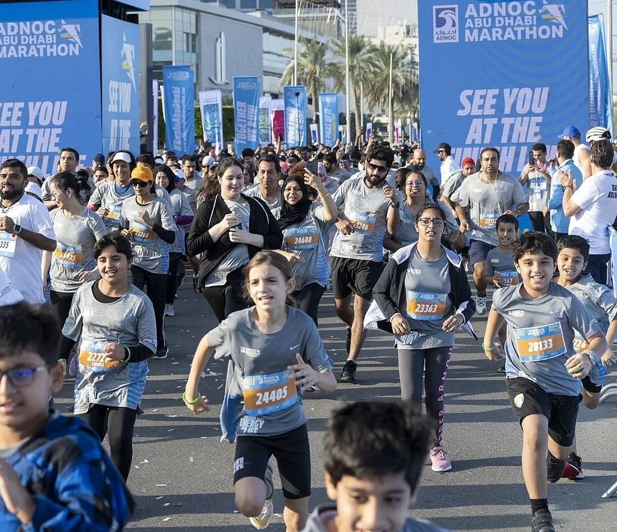 Look: 25,000 people run as new women’s record set at Adnoc Abu Dhabi ...